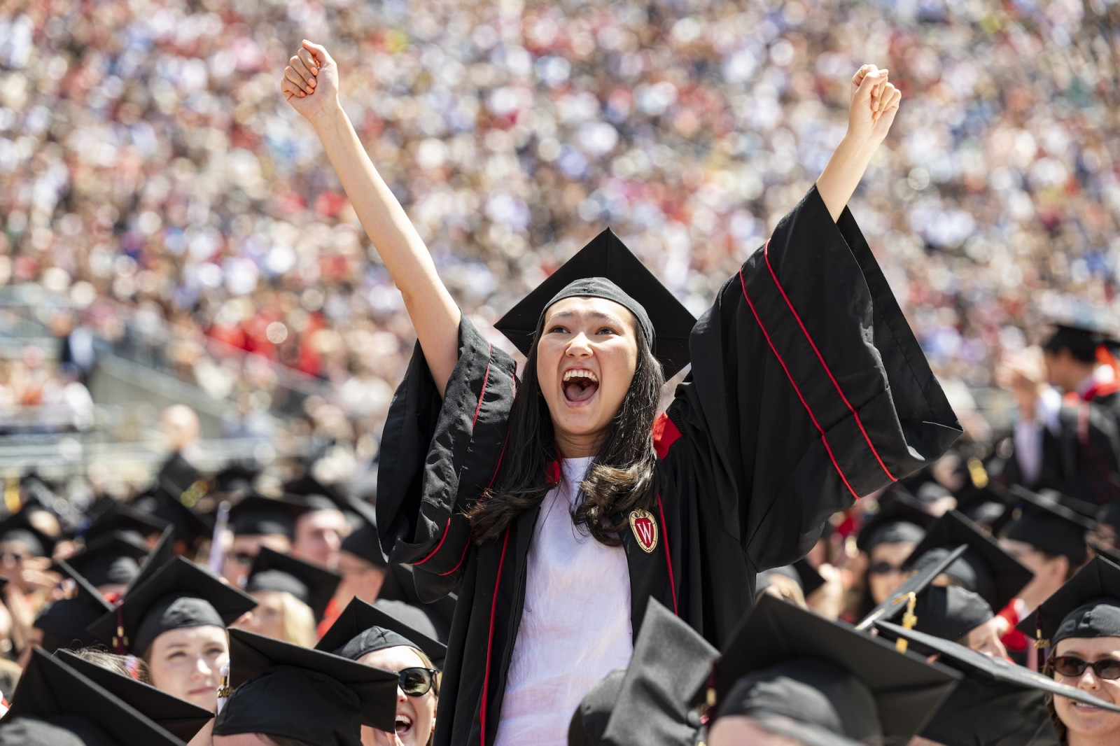 Photos: Blue skies smiled down on the graduates – UW–Madison News